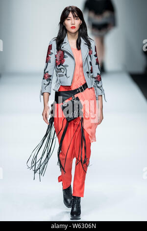 A model displays a new creation at the CHRISTOPHE TERZIAN X Nn fashion ...