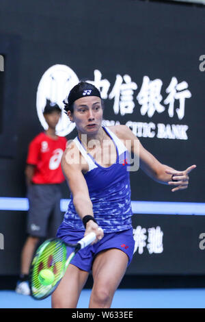 Anastasija Sevastova of Latvia returns a shot against Caroline ...