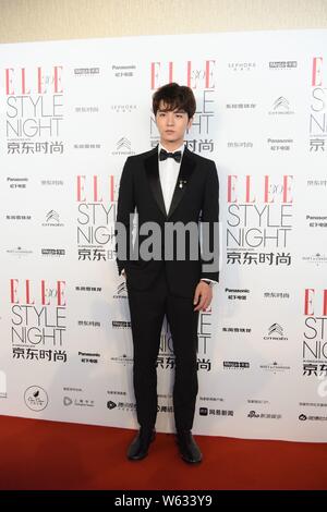 Chinese actor Caesar Wu Xize of the new lineup of Chinese boy group F4 performs during the KPL ...