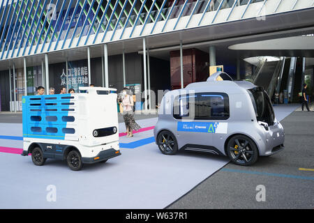 Two driverless delivery vehicles developed by the logistics arm Cainiao ...