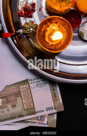 Rakhi with indian sweets and roli rice for raksha bandhan Stock Photo ...