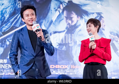 Chinese actress Sun Li, right, and her husband actor Deng Chao attend a ...