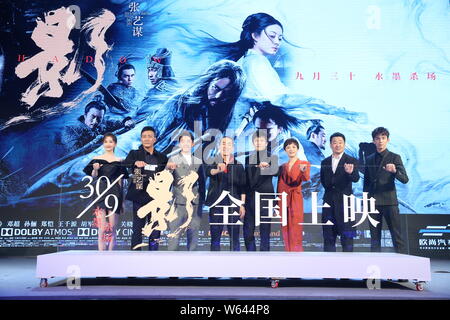 Chinese actress Guan Xiaotong, left, and actor Leo Wu or Wu Lei attend a press conference to ...