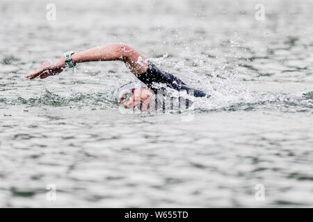 David Dellow of Australia competes in the swimming race during 2018 ...