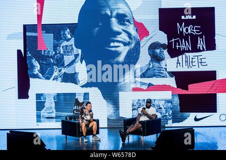 NBA star LeBron James, right, of Los Angeles Lakers attends the POWER ...