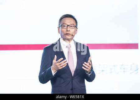 Lu Qun, Chairman of Qiantu Motor, delivers a speech during a launch ...