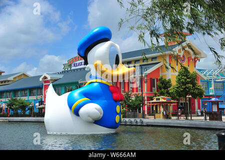 An 11-meter-tall inflatable Donald Duck is on display at the lakeside ...