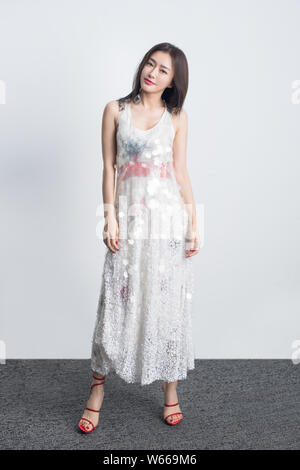 Chinese actress Qin Lan poses for portrait photos during an exclusive ...