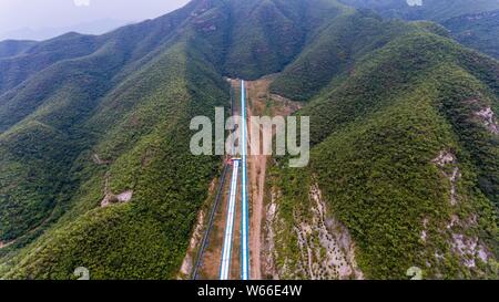 View of Asia's longest water slide at Jingzhihu Resort in Beijing ...