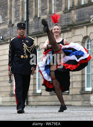 Adjutant chef Jean Michel Gatta from France is shown the Can Can dance ...