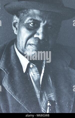 older man drinking beer from glass with hungarian tricolour flag in his ...
