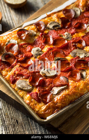 Delicious pepperoni pizza with mushrooms Stock Photo - Alamy