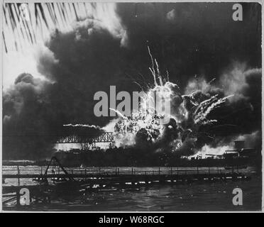 USS SHAW exploding during the Japanese raid on Pearl Harbor, T.H ...