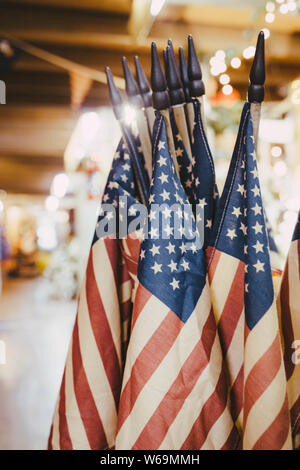Old vintage usa faded flags symbol of freedom in store Stock Photo - Alamy