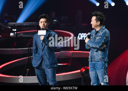 Chinese singer Li Jian, left, and actor Wu Xiubo pose as they arrive on ...