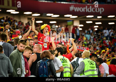 Belgian fans shout and cheer to celebrate after Belgium defeated ...