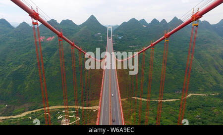 Aerial view of the Baling River Bridge 370 meters high over a valley in ...