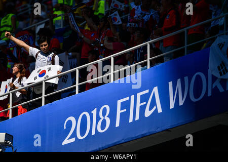 Fans of South Korea cheer during the World Cup Group A soccer match ...