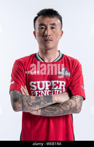 Portrait of Chinese soccer player Wang Qiuming of Tianjin TEDA F.C. for ...