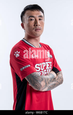 Portrait of Chinese soccer player Wang Qiuming of Tianjin TEDA F.C. for ...