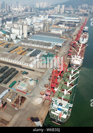 Cargo ships loaded with foreign trade containers navigate at Qingdao ...