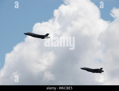 U.S. Air Force Col. Jon Hannah, left, 422nd Air Base Group commander ...
