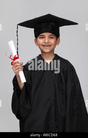 Boy celebrating graduation degree Stock Photo - Alamy