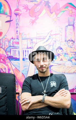 Italian artist Simone Legno attends a promotional event for Tokidoki ...