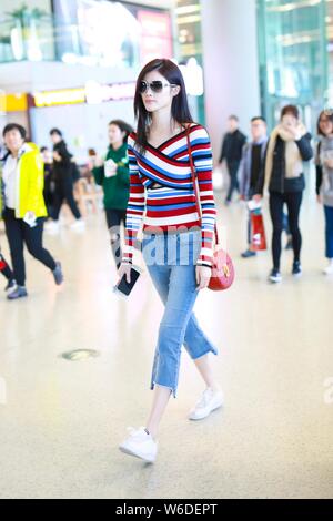 Chinese model He Sui arrives at the Shanghai Hongqiao International ...