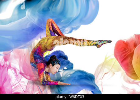 --FILE--27-year-old Chinese contortionist Liu Teng performs shows the ...