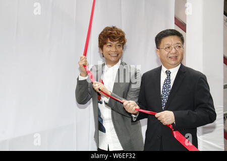Hong Kong actor and TV host Wong Cho-lam, right, and his actress wife ...