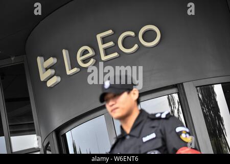 FILE - A police officer stands guard inside the St. Francis Catholic ...