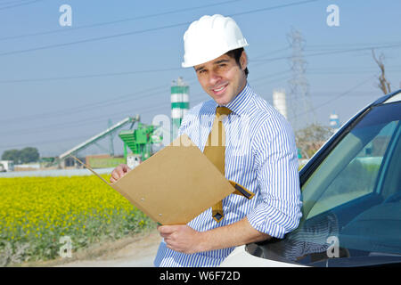 Architect doing paperwork Stock Photo - Alamy