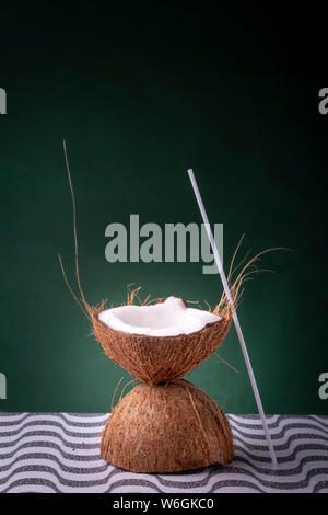 cocktail and coconut dessert on a dark background top view Stock Photo ...