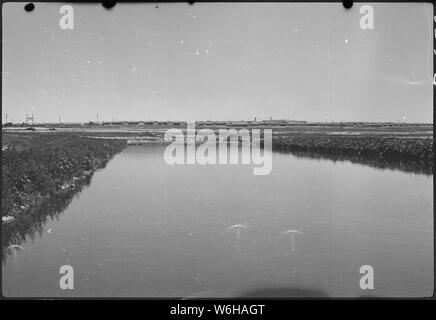 The sewage disposal plant ponds at the Granada Relocation Center in ...