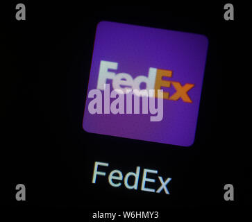 FedEx Corporation application icon on computer display Stock Photo - Alamy