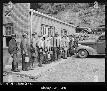 Miners waiting to check out after work. Koppers Coal Division ...