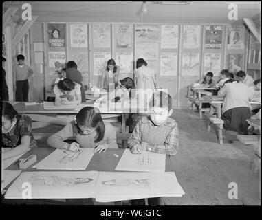 At the Minidoka Relocation Center, a free-hand drawing class is ...