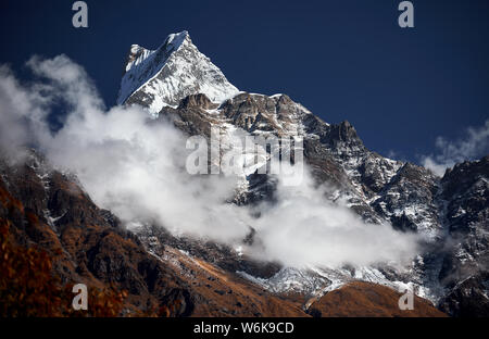 Machapuchare, Fishtail Mountain in the clouds near Pokhara, Annapurna ...
