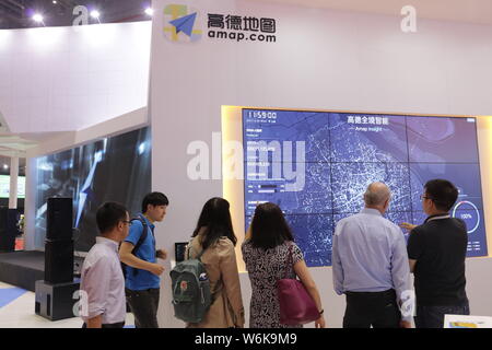 --FILE--People visit the stand of AutoNavi, the Chinese map and data ...