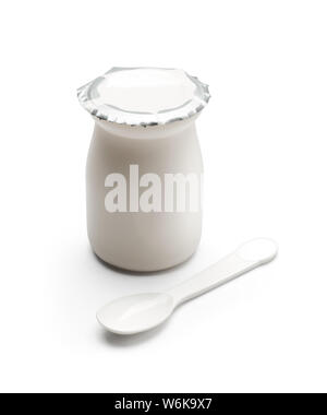 Pudding on a spoon isolated on white background Stock Photo - Alamy