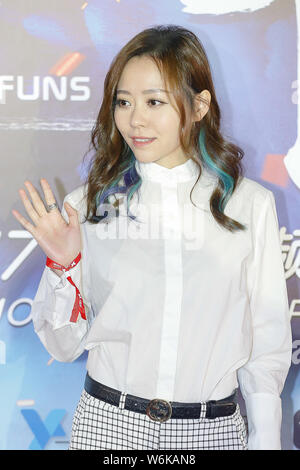 Chinese singer Jane Zhang poses during a ceremony by sina.com in ...