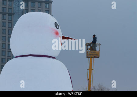 A 20-meter-tall giant snowman, which is said to be the largest one in ...