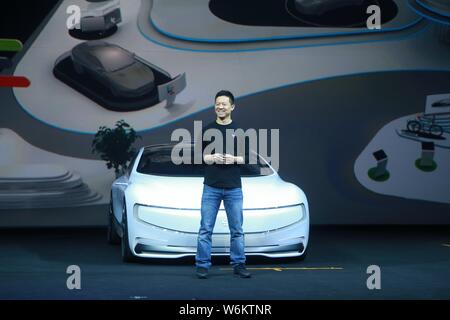 Jia Yueting, left, founder, Chairman and CEO of Letv, and Ding Lei ...