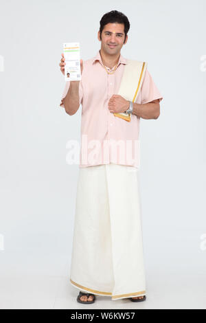 South Indian man showing an Aadhar card Stock Photo - Alamy