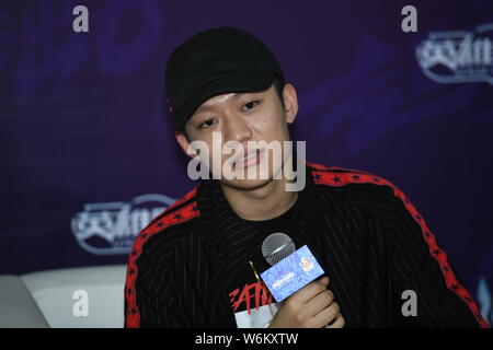 --FILE--Chinese rapper Wang Hao, better known as PG One, poses during ...