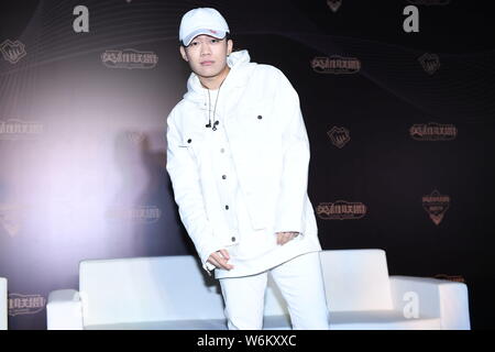 --FILE--Chinese rapper Wang Hao, better known as PG One, poses during ...