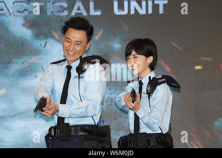 Hong Kong singers and actor Raymond Lam, left, and actress Charlene Choi of Hong Kong pop duo ...