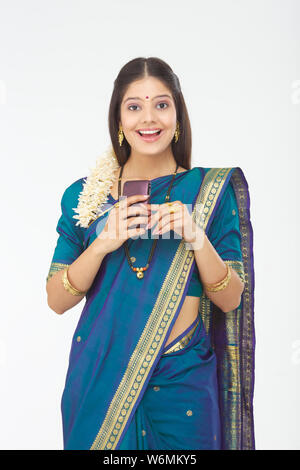 South Indian woman looking surprised Stock Photo - Alamy