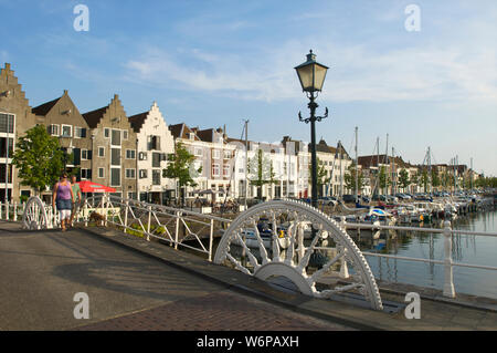The Kinderdijk and the Spijker Bridge with historic buildings in the ...